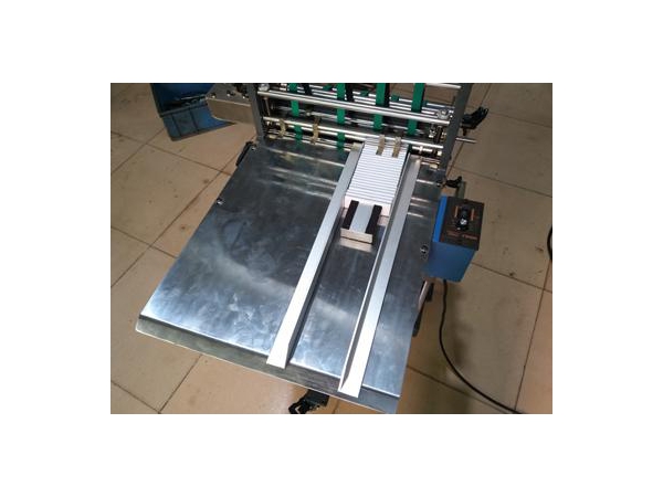 Vertical Paper Stacker | Folding Machine Supplier | KMD | ETW International