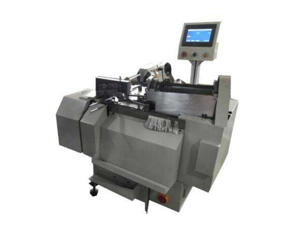 Hang Tag Stringing Machine | Tag Tying Machine | Universal Machinery ...